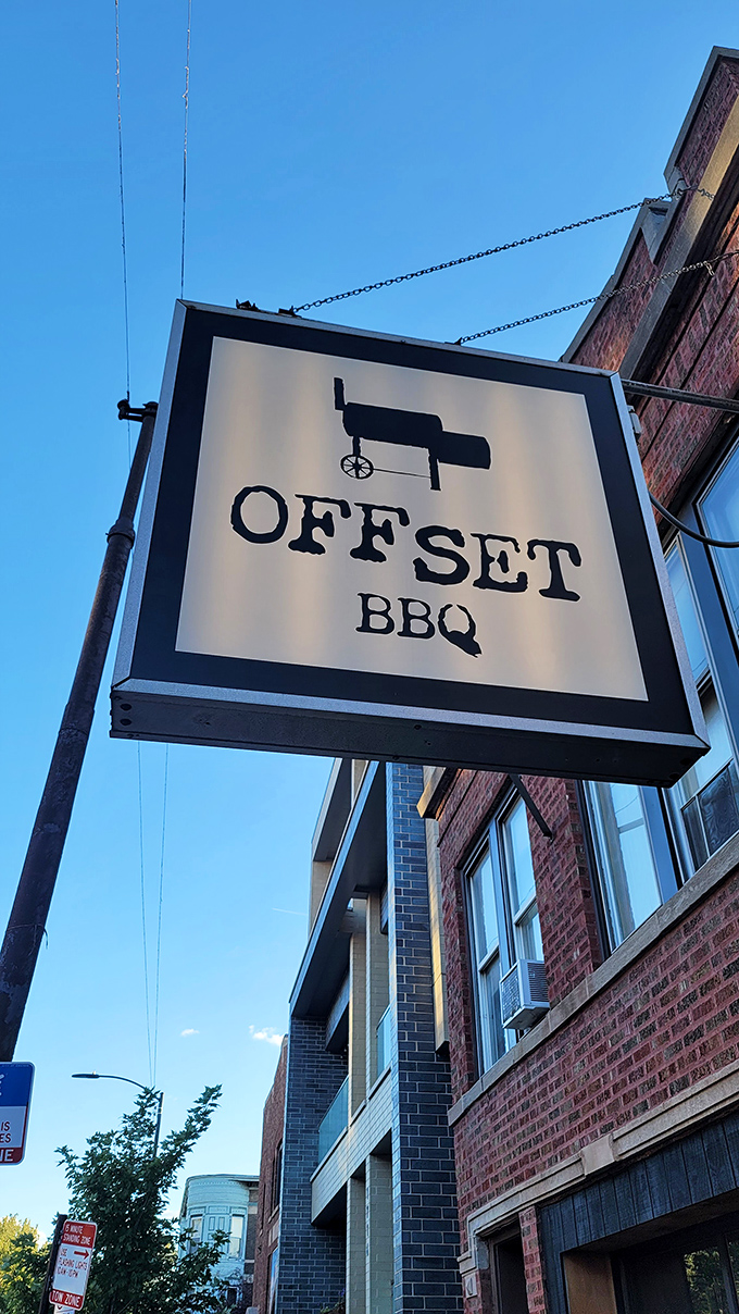 The hanging sign against a perfect blue sky &ndash; like a beacon calling to barbecue pilgrims wandering through Wicker Park in search of smoky salvation.