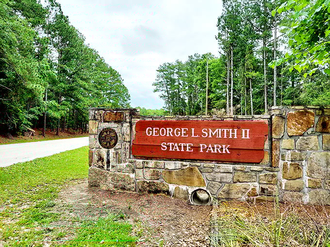 Gateway to wilderness: the stone entrance sign marks the boundary between everyday life and 1,634 acres of pure natural magic.