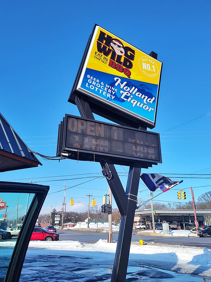 That sign isn't just advertising&mdash;it's a beacon of hope for the hungry traveler. In the barbecue universe, this yellow billboard is as welcoming as a front porch light.