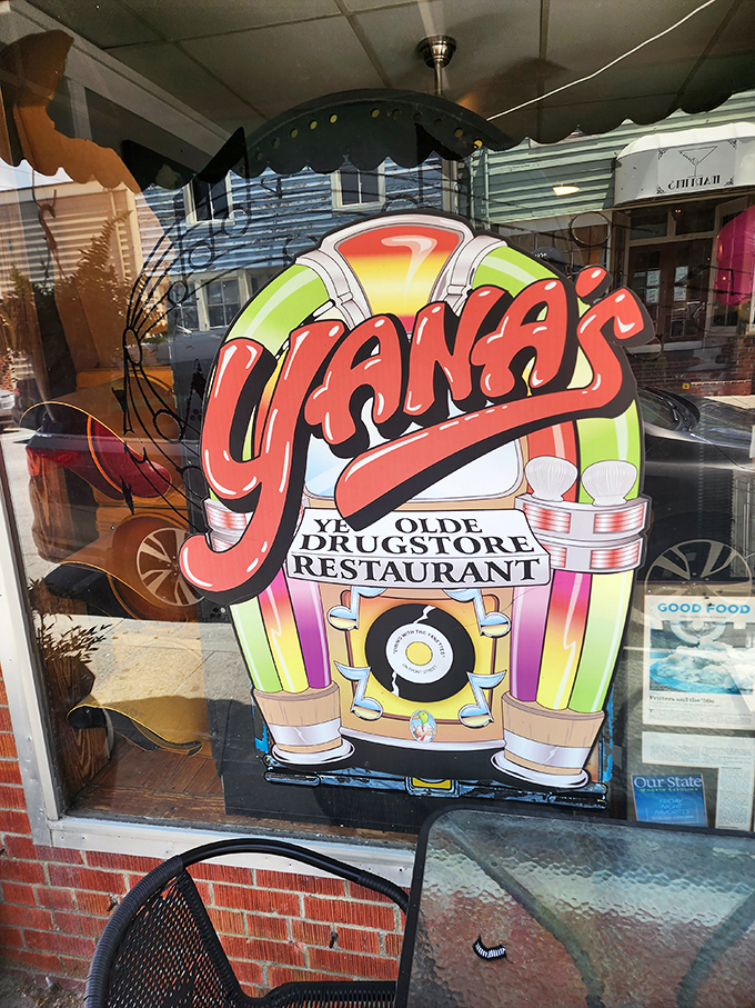 "Yanas Olde Drugstore Restaurant" proclaims the colorful window sign. A jukebox silhouette promises good times inside.
