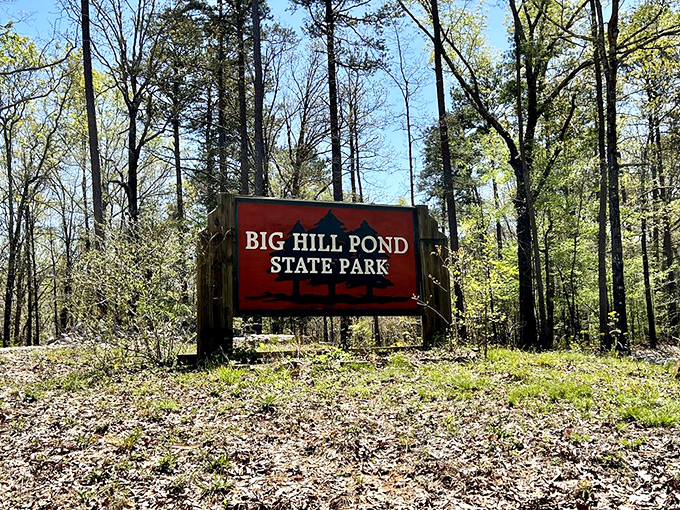 The entrance sign stands like a promise of what's to come&mdash;a red herald announcing you've officially left your worries at the county line.