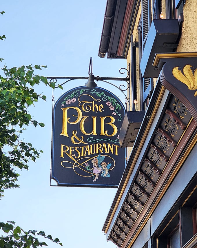 The vintage sign swinging gently above the sidewalk&mdash;a beacon for hungry travelers and locals alike, promising good times and better food inside.