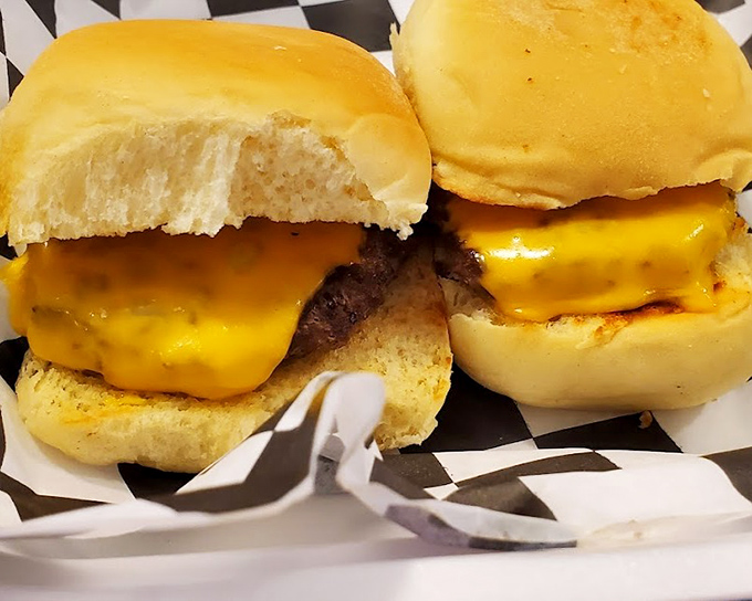 These sliders aren't just mini burgers&mdash;they're proof that sometimes the most perfect things come in small packages with melted cheese blankets.