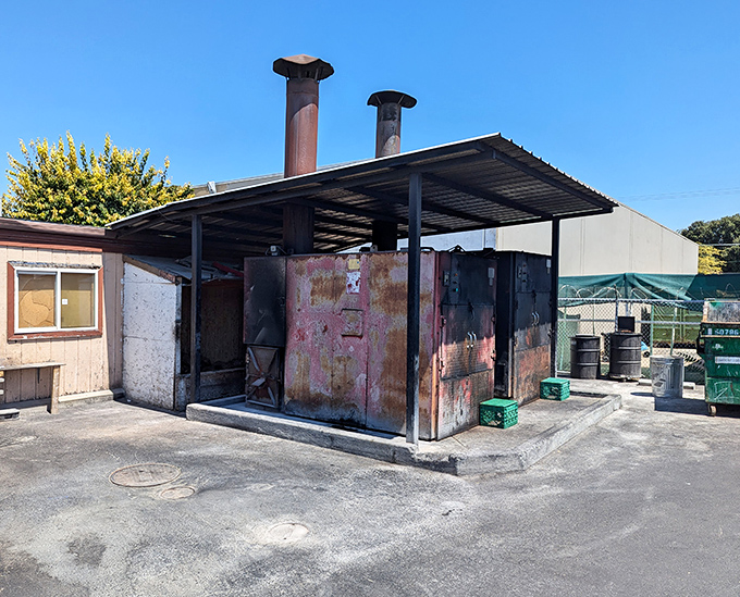 These battle-worn smokers have seen more action than a Hollywood stuntman. The patina of smoke and time is the mark of BBQ authenticity.