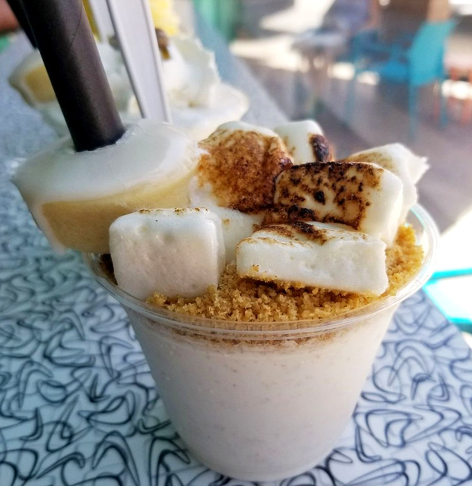 Campfire nostalgia in liquid form. The S'mores Shake with its toasted marshmallows and graham cracker crumbs takes you straight back to childhood summers.