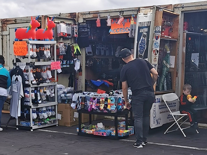 Sock shopping made spectacular! This vendor's colorful display proves that even the humblest wardrobe necessity can become an expression of personality.