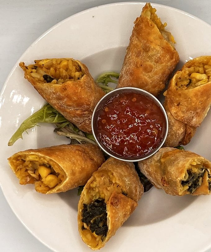 Egg rolls with a Southern drawl &ndash; crispy wrappers hiding treasures of collards and corn that prove fusion food can have both roots and wings.