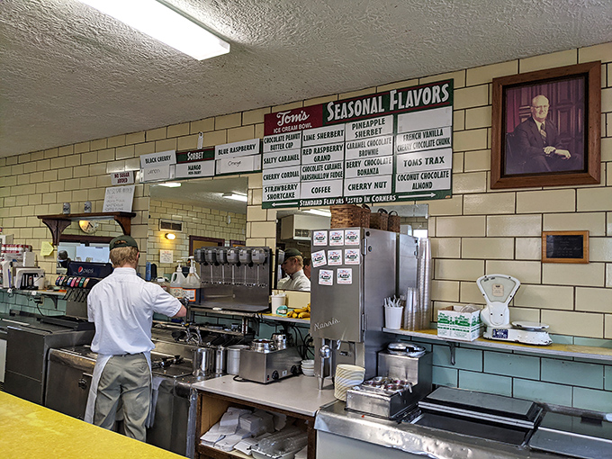 The seasonal flavor board&mdash;a rotating gallery of frozen art. Each handwritten option represents decades of ice cream craftsmanship and tradition.