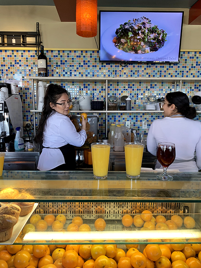 Behind the counter, fresh-squeezed juices and pastries await &ndash; where staff orchestrate the morning ritual that powers New Jersey's day.