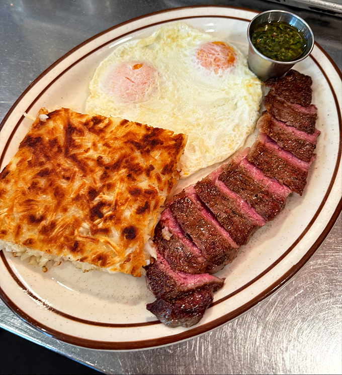 Steak and eggs: the breakfast of champions, or at least people who plan to skip lunch. That medium-rare beef deserves its own thank-you note.