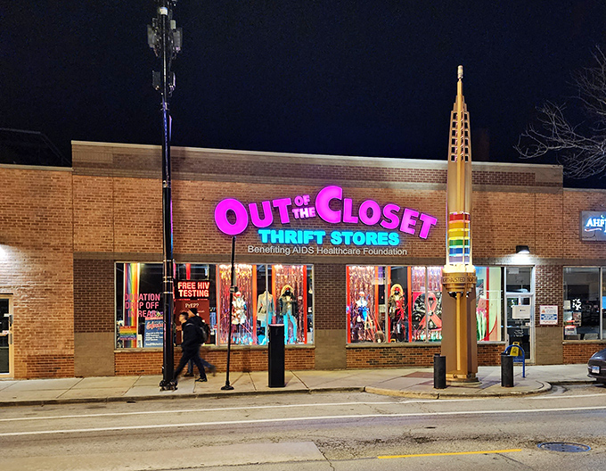 After dark, the store glows like a pink-and-teal lighthouse, guiding night owls to fashion finds and furniture fantasies even after sunset.