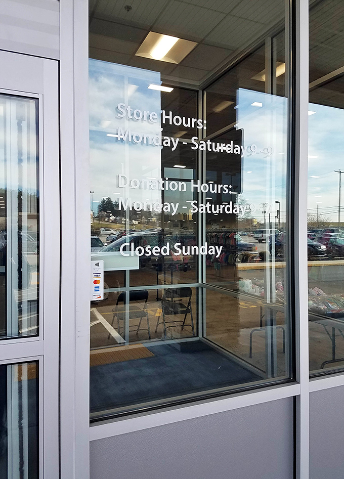 The hours posted clearly&mdash;because even treasure hunting requires planning, and Sunday is reserved for counting the weekend's thrifting victories.