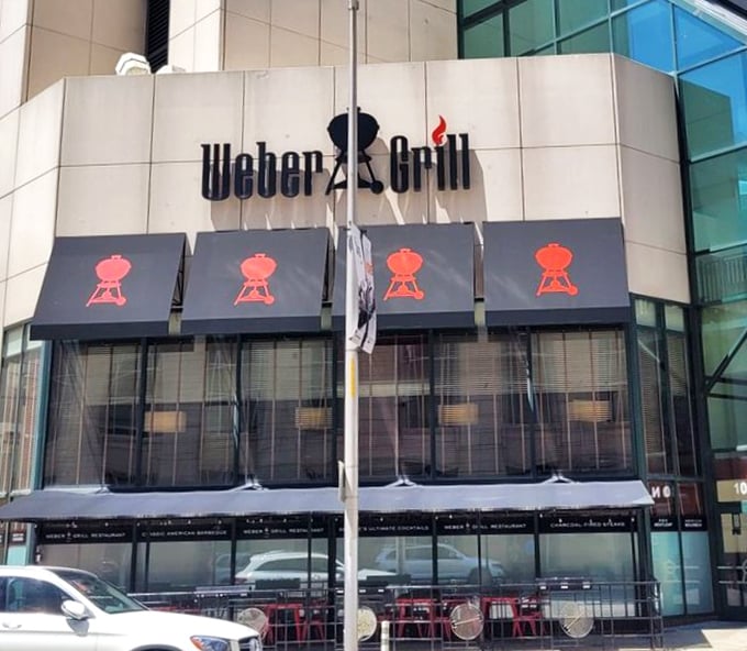 The restaurant's exterior seamlessly blends into downtown's modern landscape while that row of Weber icons reminds you what awaits inside.