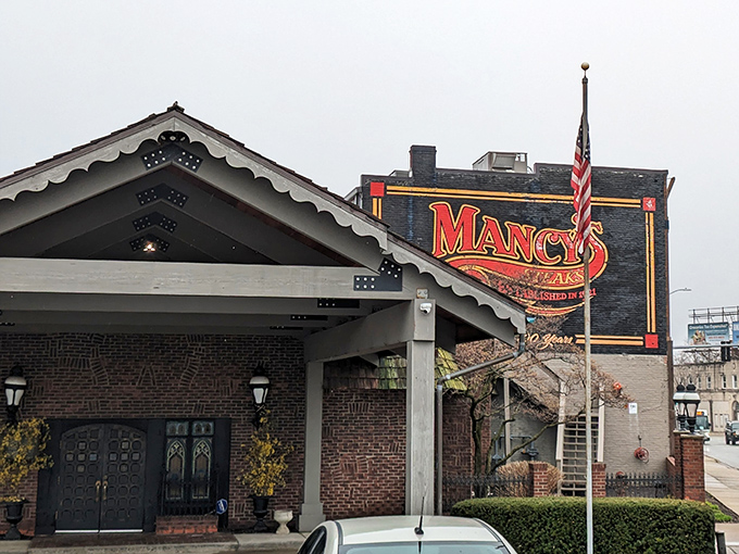 The American flag flies proudly beside that unmistakable Mancy's signage &ndash; because great steaks are practically patriotic.