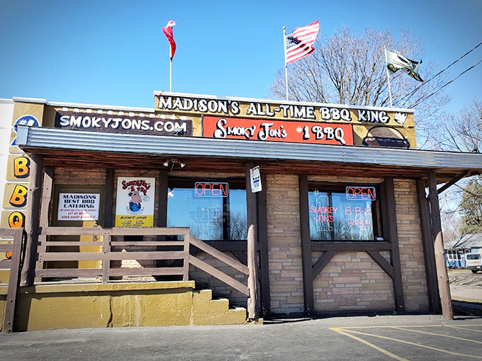 The flags fly proudly above Madison's BBQ institution, a beacon of smoke and satisfaction that's become a landmark for meat lovers everywhere.