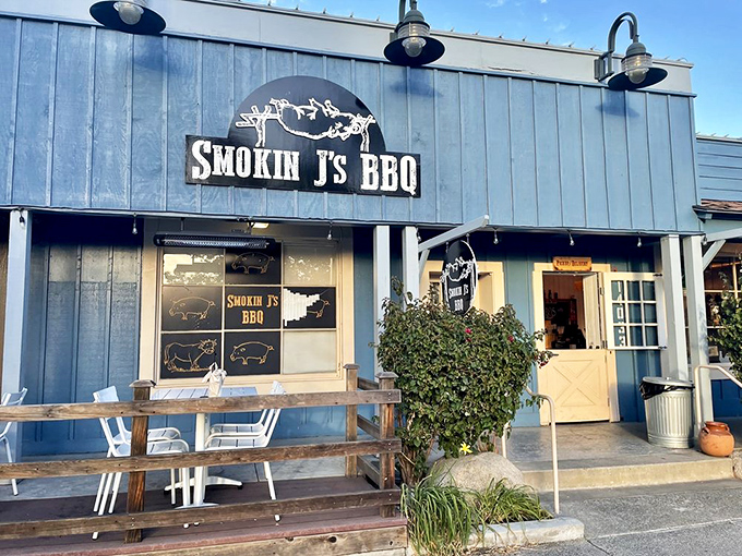 The blue storefront that launches a thousand cravings. This unassuming exterior hides flavor bombs that'll haunt your dreams for weeks.