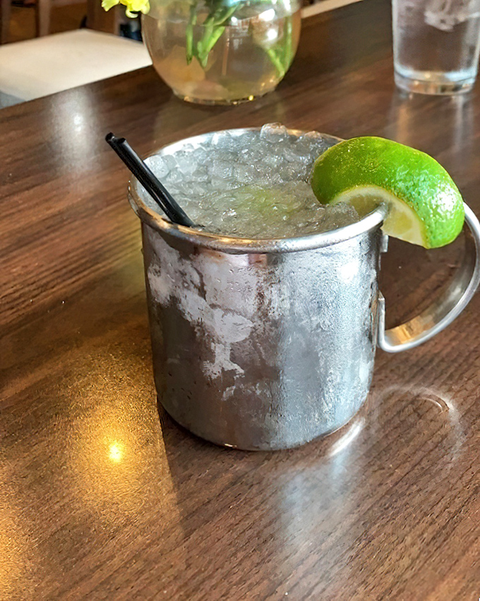 A Moscow Mule with a coastal twist—served in the traditional copper mug that keeps it cold enough to make even Pittsburgh summers bearable.