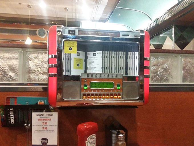The tabletop jukebox &ndash; a time machine disguised as a music box, ready to soundtrack your meal with hits from simpler times.
