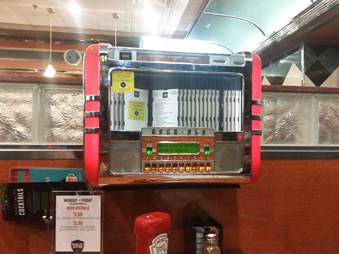 The tabletop jukebox &ndash; a time machine disguised as a music box, ready to soundtrack your meal with hits from simpler times.