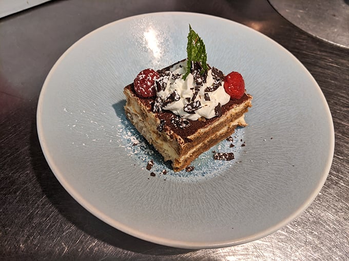 The tiramisu arrives looking like it graduated with honors from Italian Dessert Academy &ndash; layers of coffee-soaked perfection topped with just enough cocoa.