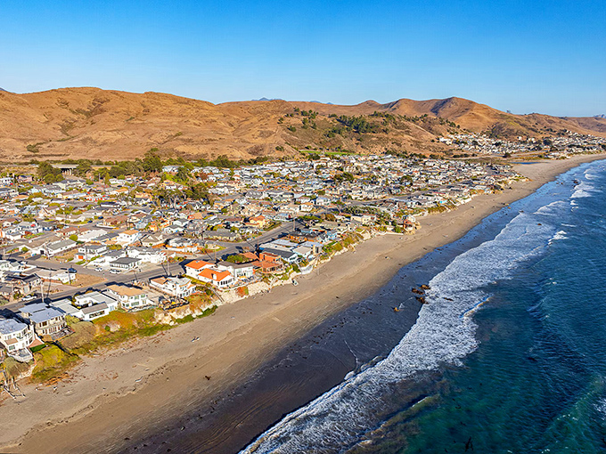 Cayucos from the sky reveals the perfect marriage of golden hills and blue Pacific, a coastal hamlet that time politely decided to overlook.