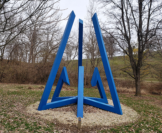 Geometric precision meets artistic vision in this blue triangle installation that looks like it might be solving a mathematical equation just for fun.