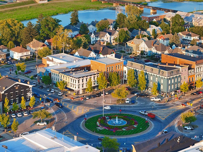 This aerial view of Troy's downtown showcases the perfect roundabout that locals navigate with ease while visitors circle it like they're entering the Thunderdome.