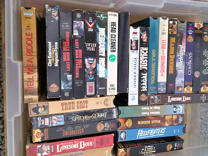 VHS treasure trove that would make Blockbuster weep with nostalgia. "True Grit" and "Lonesome Dove" stand ready for your vintage movie marathon.
