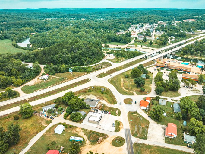 From above, Van Buren reveals its perfect positioning along the Current River, nestled in Ozark hills that have remained largely unchanged for centuries.