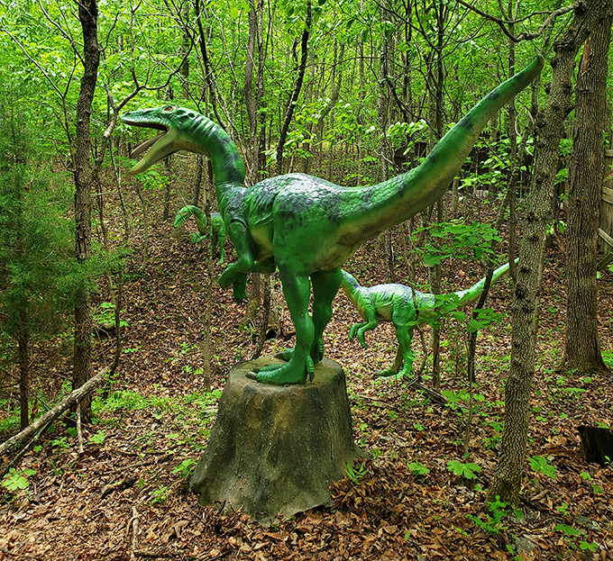 This vibrant green velociraptor stands ready to pounce from its tree stump &ndash; the stuff of both nightmares and fantastic vacation photos.