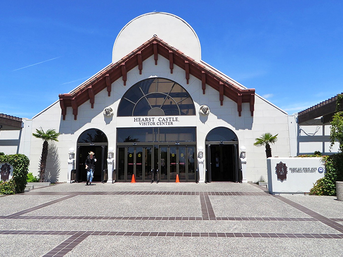The visitor center welcomes modern-day pilgrims to this cathedral of excess. Its modest exterior gives no hint of the opulence waiting just up the hill.