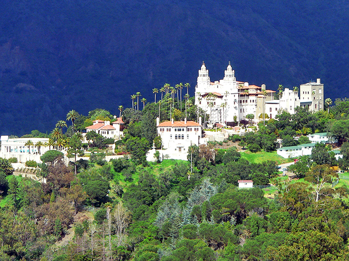 Perched dramatically on its hilltop, Hearst Castle commands the landscape like a Mediterranean mirage floating above the California coastline.