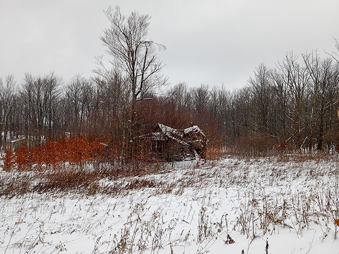 Winter blankets Mount Jewett's countryside in pristine white, creating a serene landscape where abandoned structures become accidental works of art.