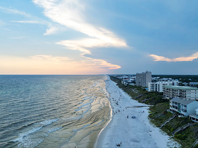 The coastline stretches like nature's welcome mat. From this height, you can almost hear the waves calling your name.