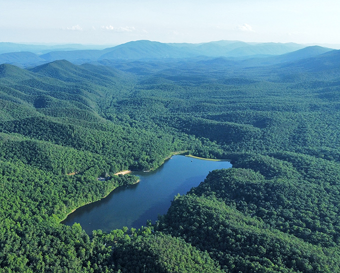 From above, Douthat Lake looks like a sapphire carefully placed in an emerald setting. Mother Nature showing off her jewelry design skills.
