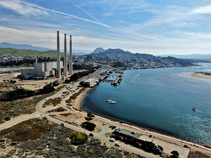 This bird's-eye view reveals Morro Bay's perfect balance of land and sea, with the iconic rock anchoring the scene like nature's exclamation point.