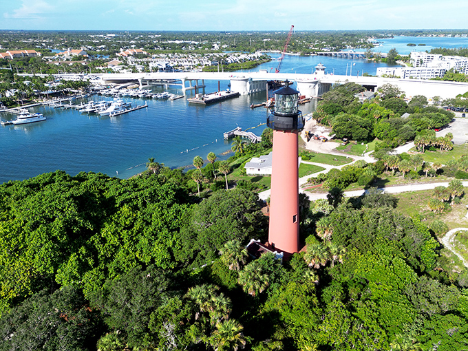 The aerial view reveals Jupiter Inlet's perfect marriage of natural beauty and historical significance&mdash;Florida showing off its best assets from above.