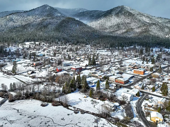 Winter transforms Etna into a snow globe come to life, where the mountains wear white caps and the town nestles in like a postcard made real.