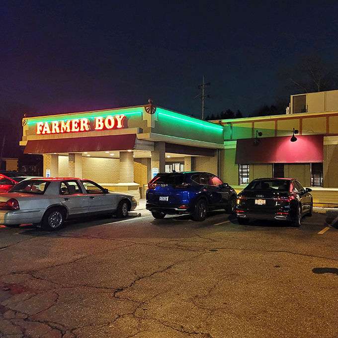 At night, the neon glow of Farmer Boy transforms into a lighthouse for the hungry. Even in darkness, this culinary landmark stands ready to serve.