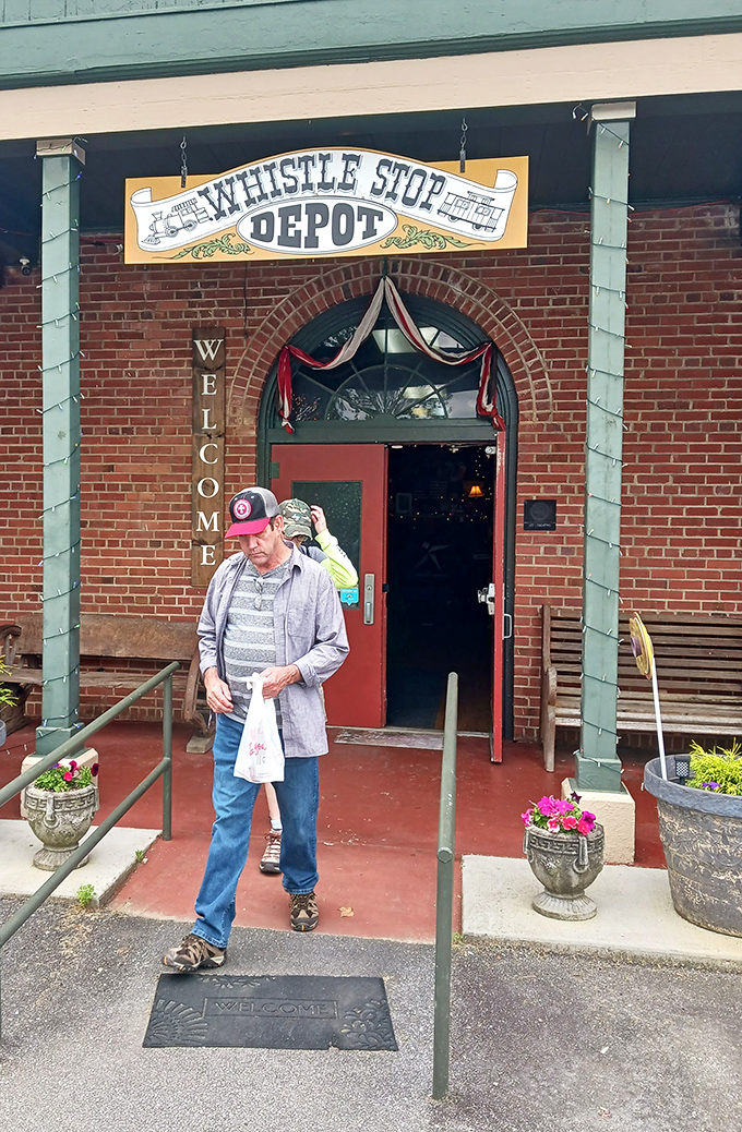 The welcoming entrance to Whistle Stop Shop Depot promises adventure within. Those flower pots have greeted countless treasure hunters embarking on their quests.
