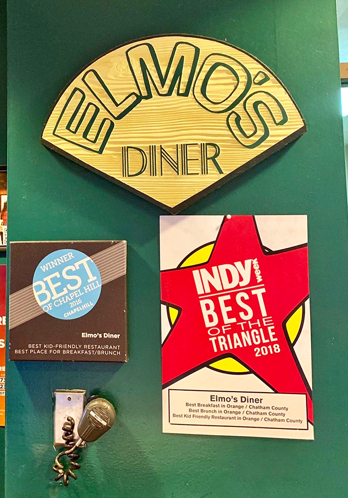 Wall of fame! These awards aren't just decorations—they're battle medals earned in the competitive field of making people incredibly happy through food.