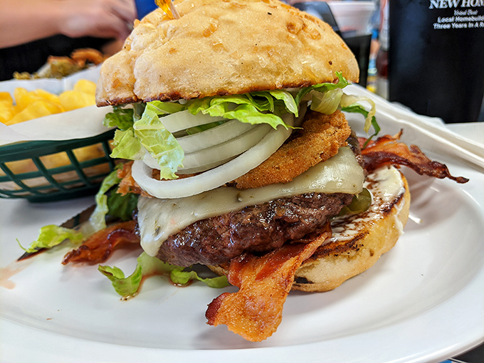 This isn't just a burger&mdash;it's an architectural marvel of beef, bacon, and cheese that requires both hands and absolutely zero shame.