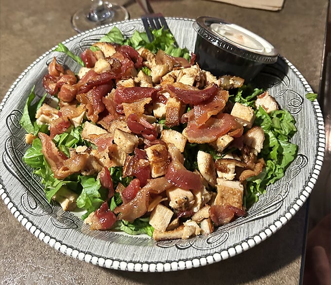 A salad that understands protein isn't optional. When bacon and chicken join forces atop fresh greens, everybody wins.