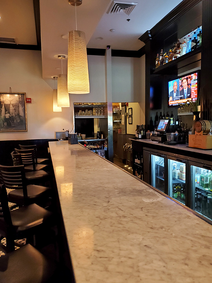 A marble bar top that's witnessed countless first dates, business deals, and the internal debate of "just one more oyster" playing out in real time.