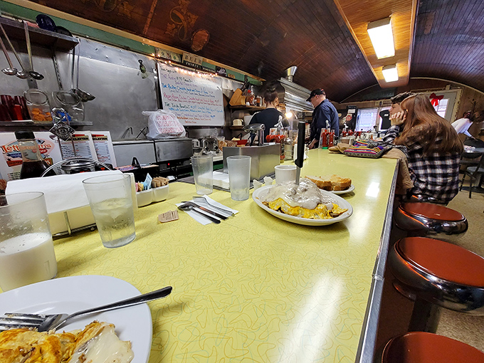 The yellow countertop&mdash;a front-row seat to the breakfast show. Half the experience is watching your meal come to life before your very eyes.
