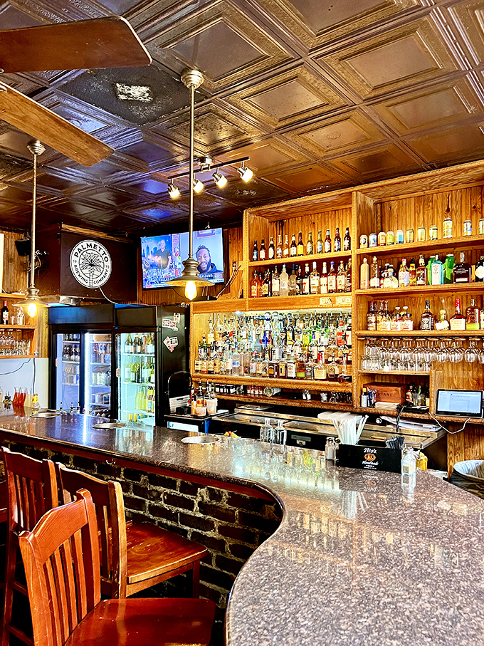 The well-stocked bar gleams with promise, a liquid library of spirits where your next favorite cocktail is just waiting to be discovered.