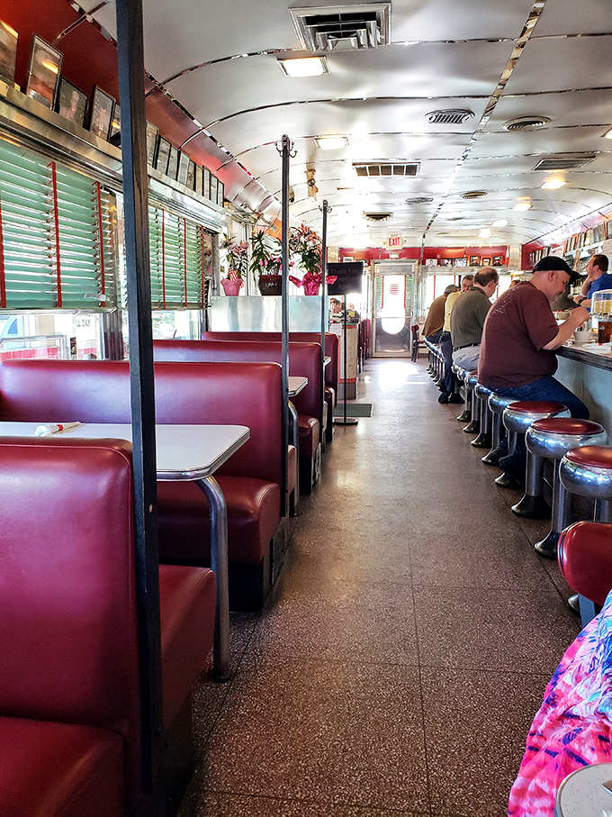 Those burgundy booths have witnessed first dates, family reunions, and countless coffee refills – silent historians of everyday American life.