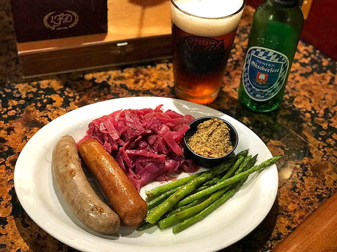 German sausages with red cabbage that transport you to Bavaria without the jet lag. Paired with that beer? Pure European vacation on a plate.