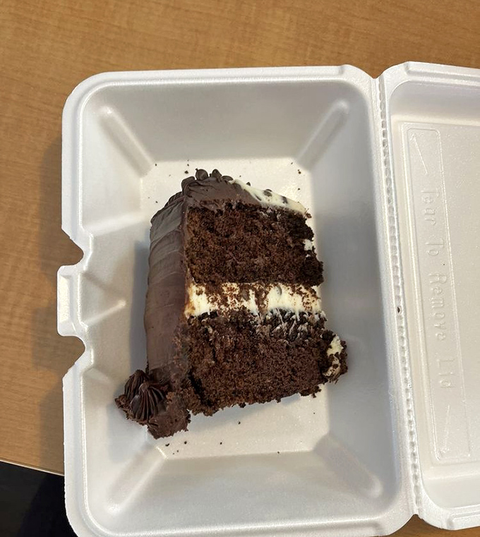 Chocolate cake that doesn't know the meaning of restraint. That layer of frosting in the middle isn't just generous&mdash;it's downright philanthropic.