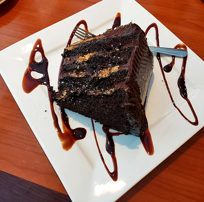 Chocolate cake that doesn't just satisfy your sweet tooth&mdash;it throws a party for it, complete with decorative sauce swirls that are practically edible calligraphy.